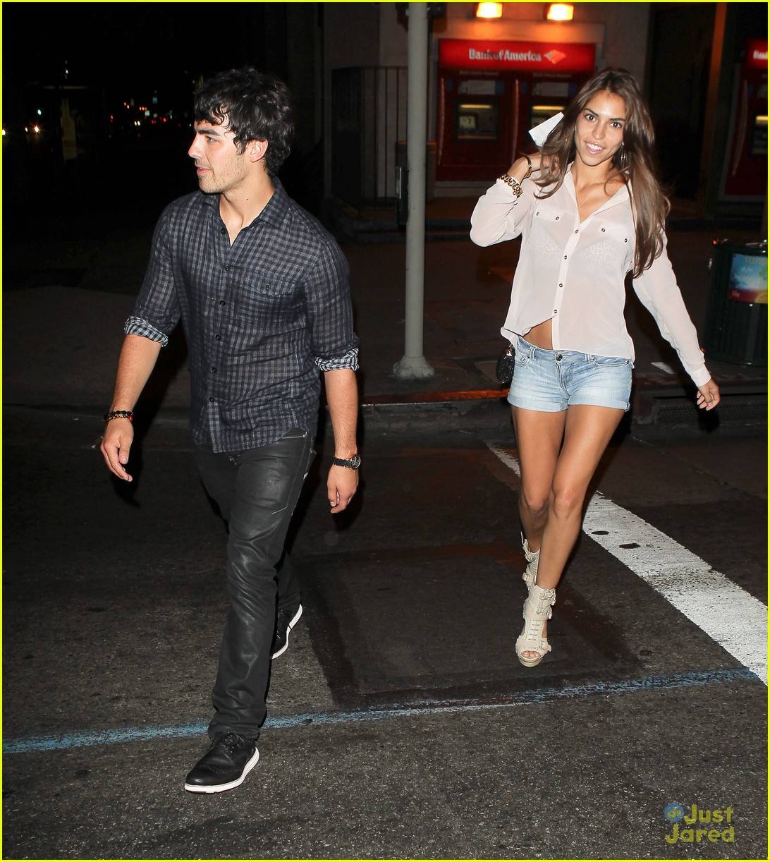 Joe & Nick Jonas: 'Dark Knight Rises' Midnight Showing in Hollywood ...
