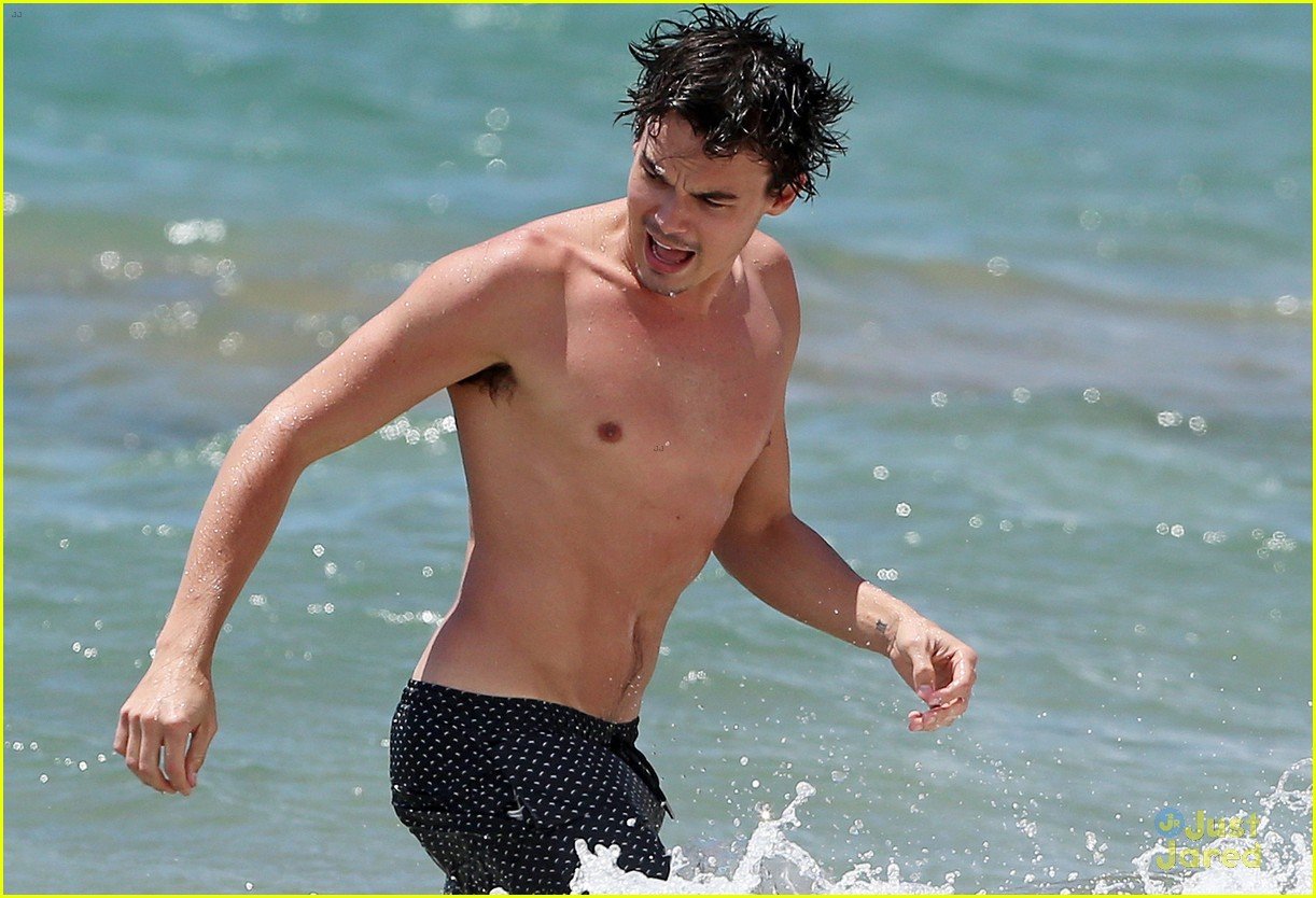 Tyler Blackburn Kisses Girlfriend During Romantic Beach Rendezvous in ...