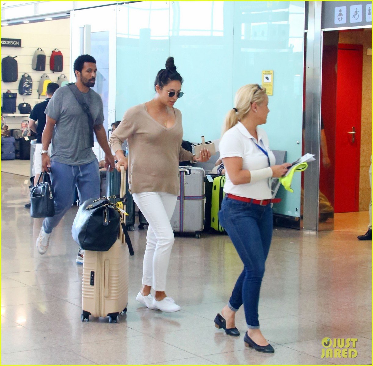 Pregnant Shay Mitchell Laughs At Partner Matte Babel At The Airport ...