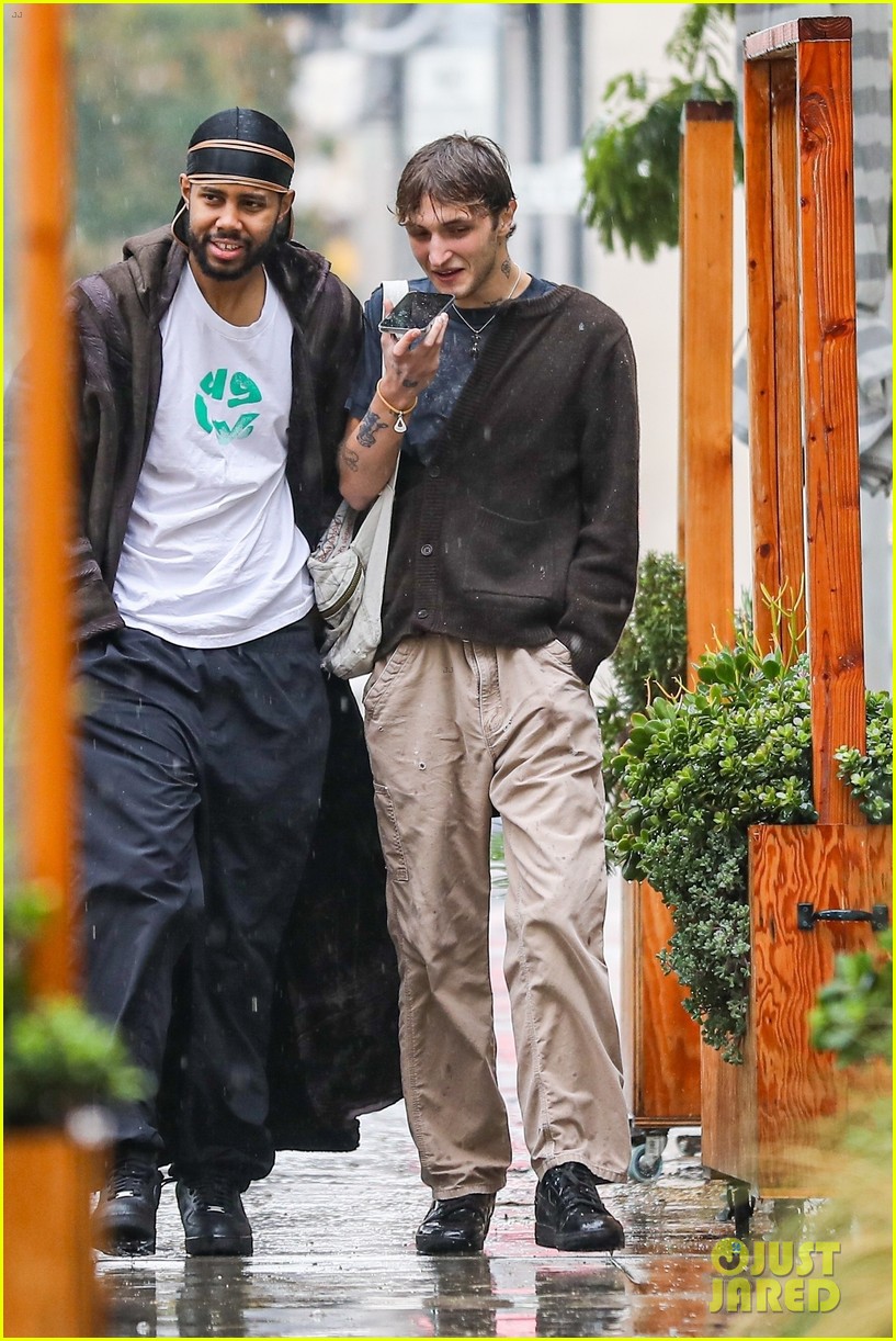 Anwar Hadid Braves the Rainy Weather While Hanging Out with a Friend in ...