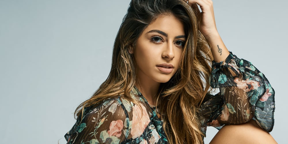 Laura Pieri Hacks Her Way To Riches in ‘I Will Follow You’ Video ...