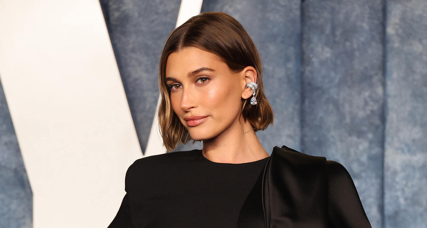 Hailey Bieber’s Dress Sleeve Hits the Floor at Vanity Fair Oscars Party ...